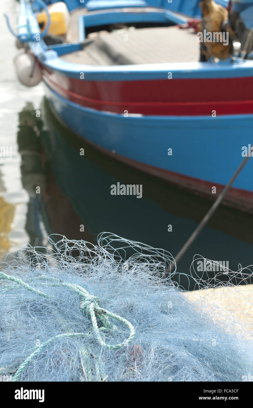 Fishing Boat and nets Stock Photo - Alamy