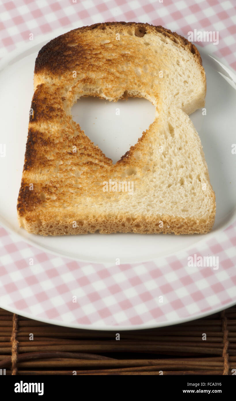 Toast with heart-shaped Stock Photo - Alamy