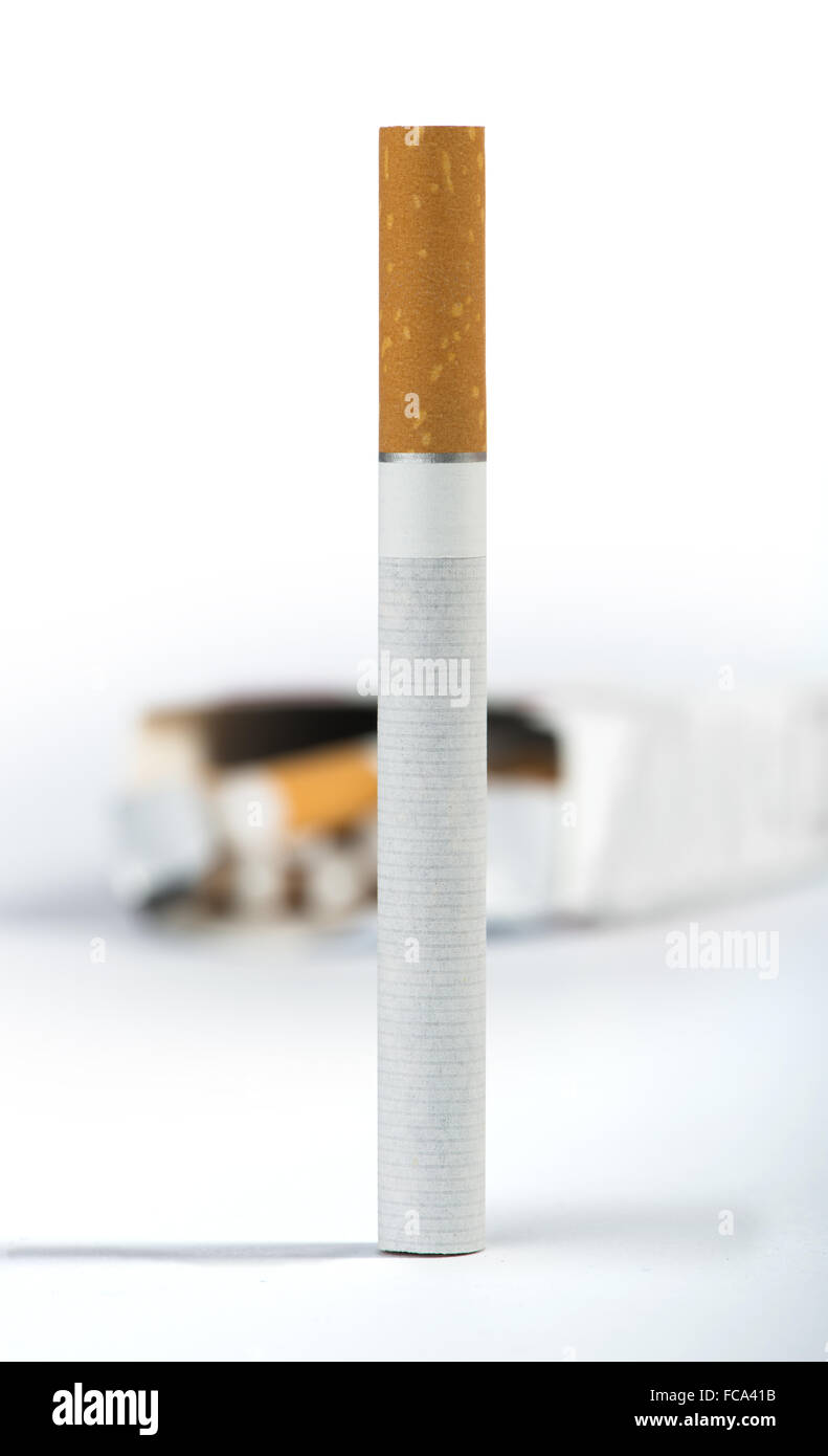 Cigarette on the foreground Stock Photo - Alamy