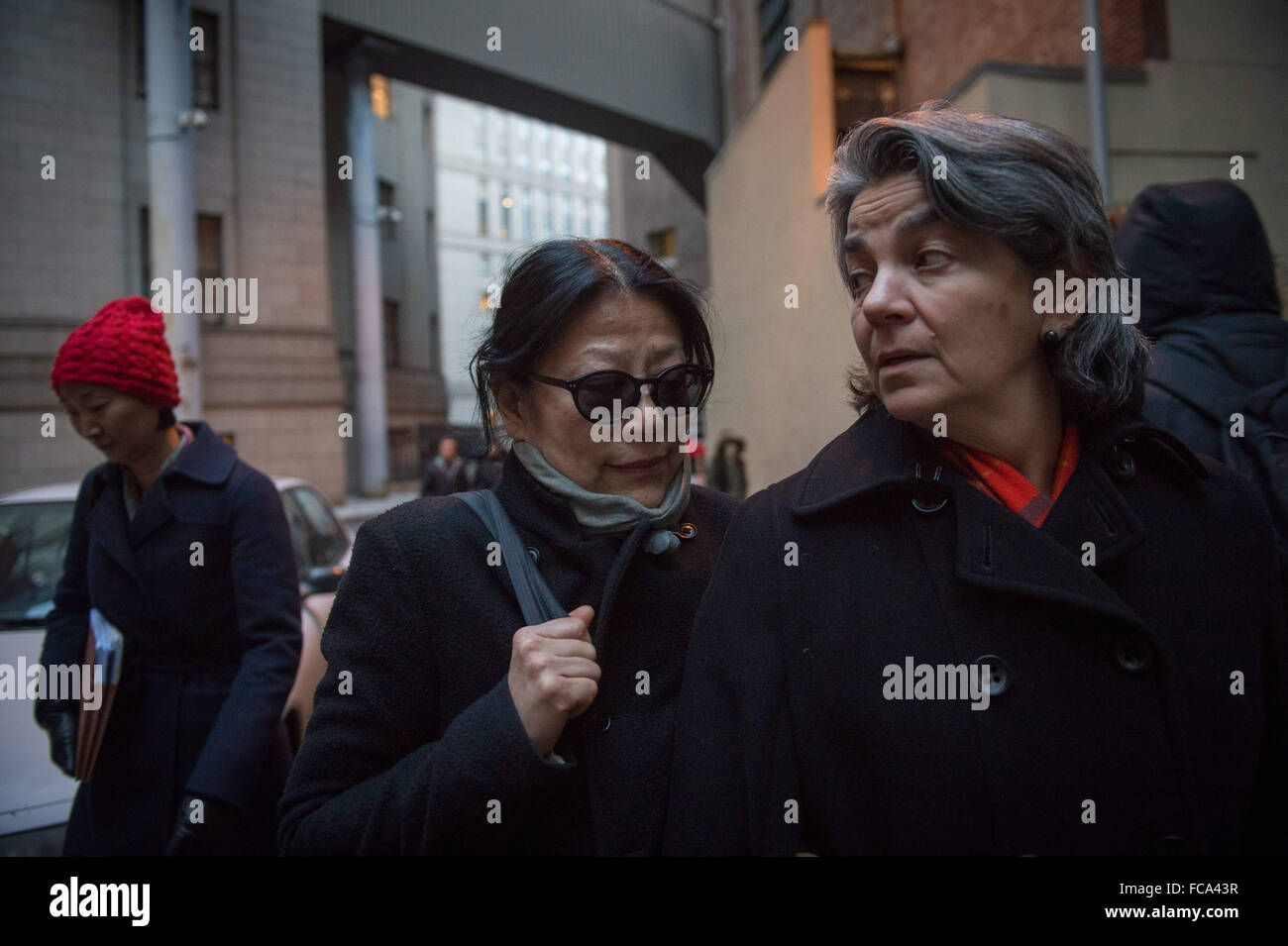 New York, NY, USA. 20th Jan, 2016. SHERI YAN, center, exits District ...