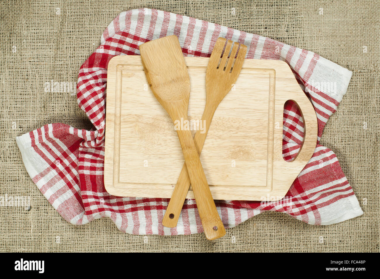 Cross wooden fork and spoon Stock Photo - Alamy