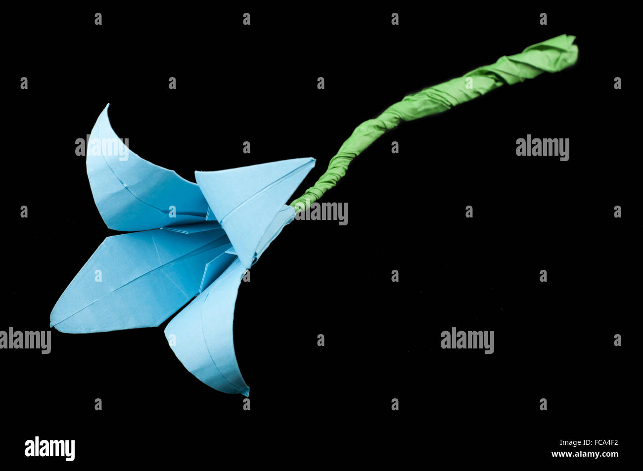 Blue Flower origami black isolated Stock Photo - Alamy