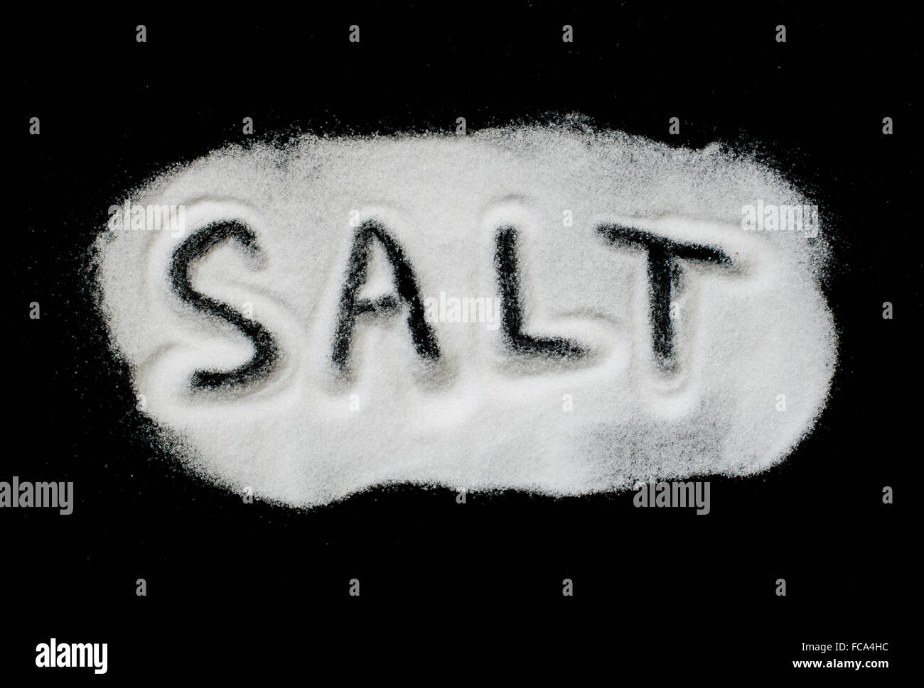 Word Salt on black background Stock Photo - Alamy