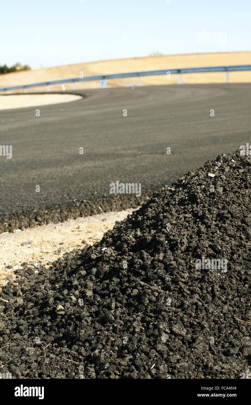 Asphalt and asphalting the road Stock Photo - Alamy