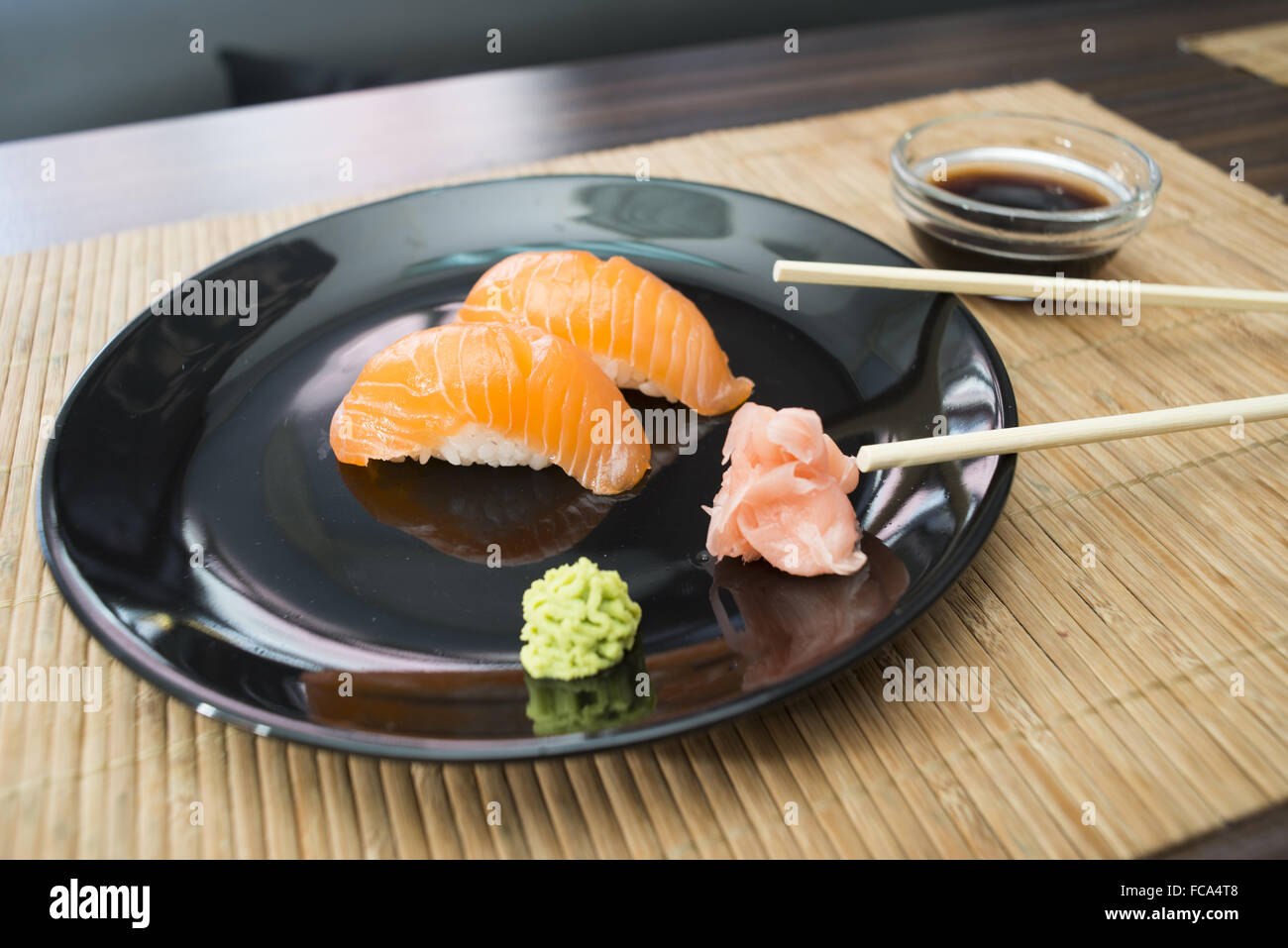 Sushi in sushi bar Stock Photo - Alamy