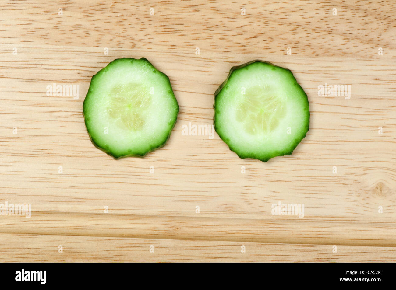 Two cucumber slices Stock Photo - Alamy