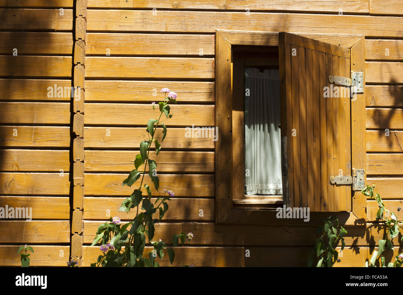 Wooden bungalow window Stock Photo - Alamy