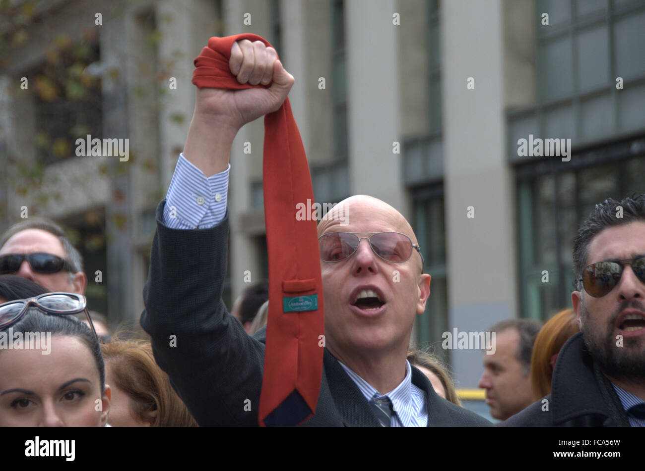 Athens, Greece. 21st Jan, 2016. A man waving a red necktie during demonstration in Greece. A ...