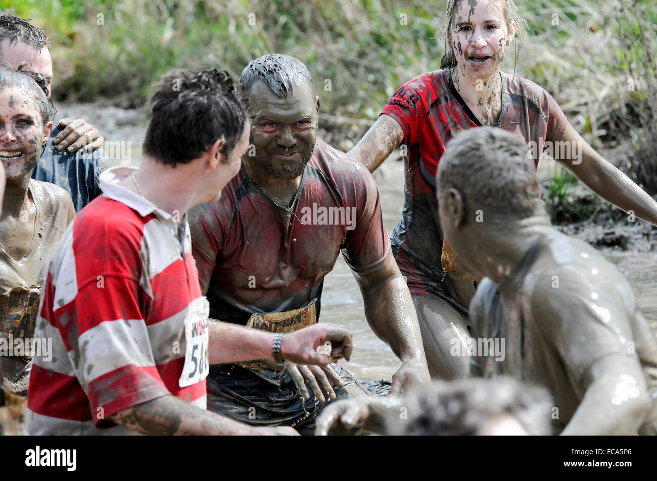Runners at obstacle course race, UK Stock Photo - Alamy