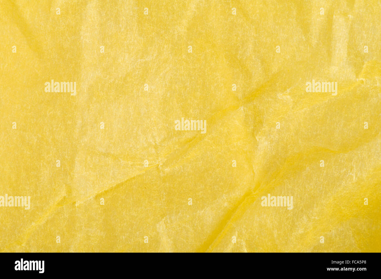 Crumpled yellow paper Stock Photo - Alamy