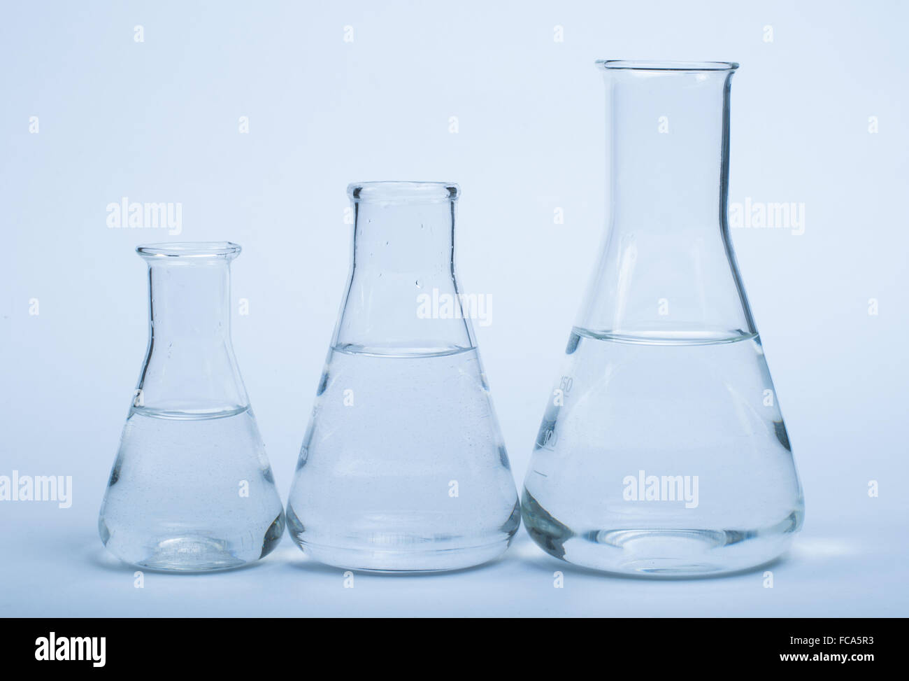 Empty glass laboratory utensils Stock Photo - Alamy