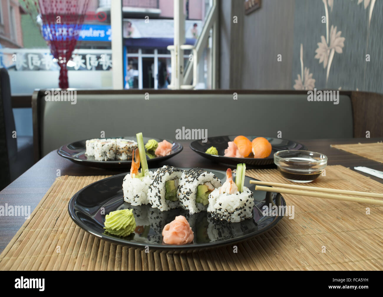 Sushi in restaurant Stock Photo - Alamy