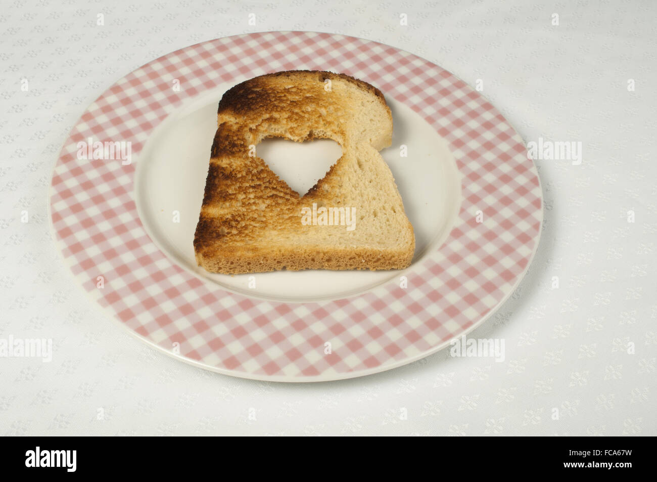 Toast with heart-shaped Stock Photo - Alamy