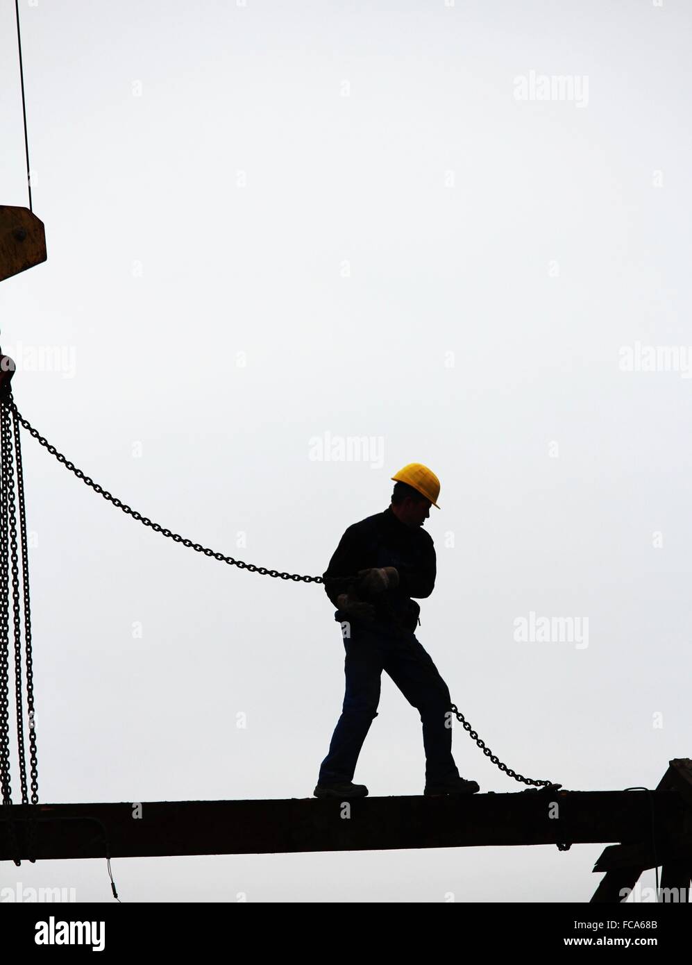 Construction worker on a girder Stock Photo - Alamy