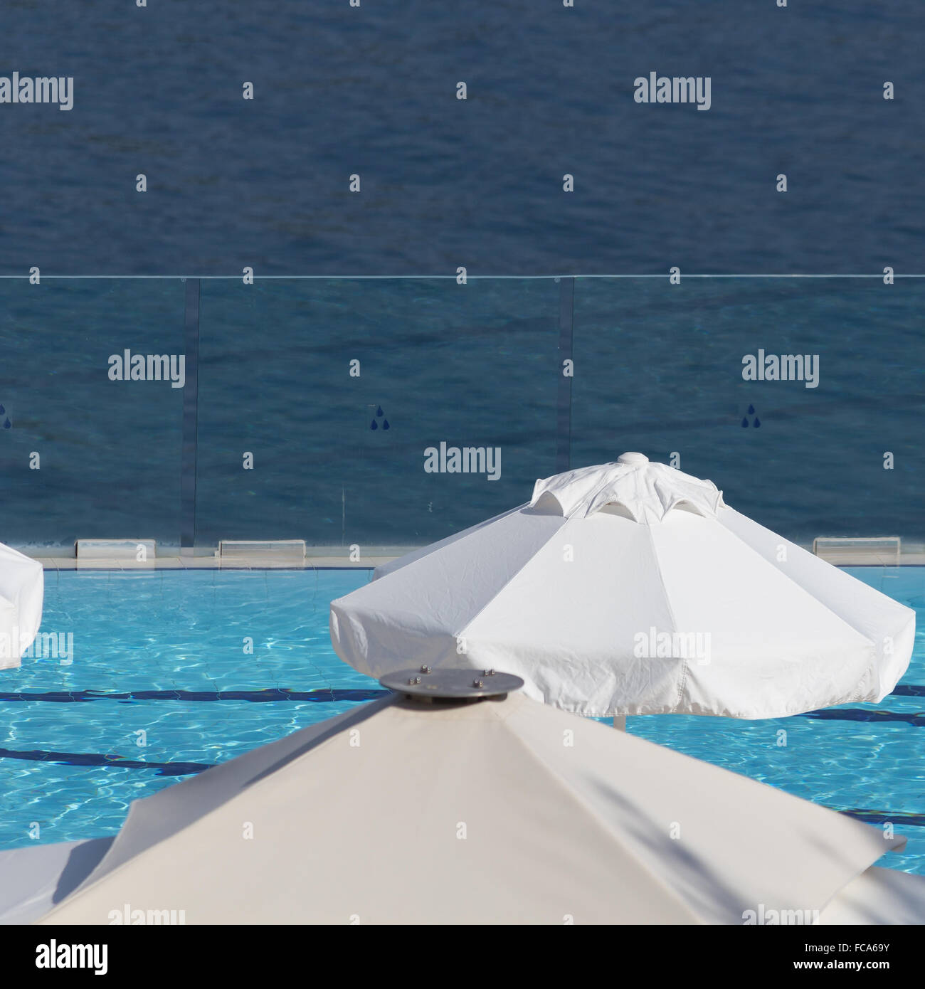 Turquoise parasols hi-res stock photography and images - Alamy