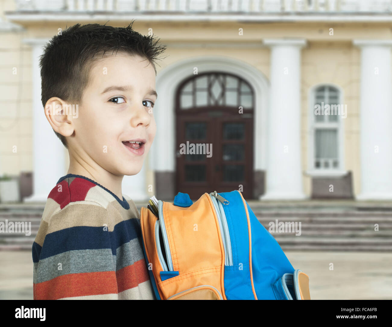 Boy with schoolbag Stock Photo - Alamy