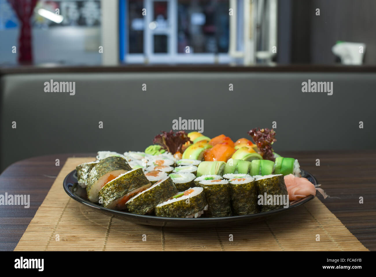 Sushi in restaurant Stock Photo - Alamy