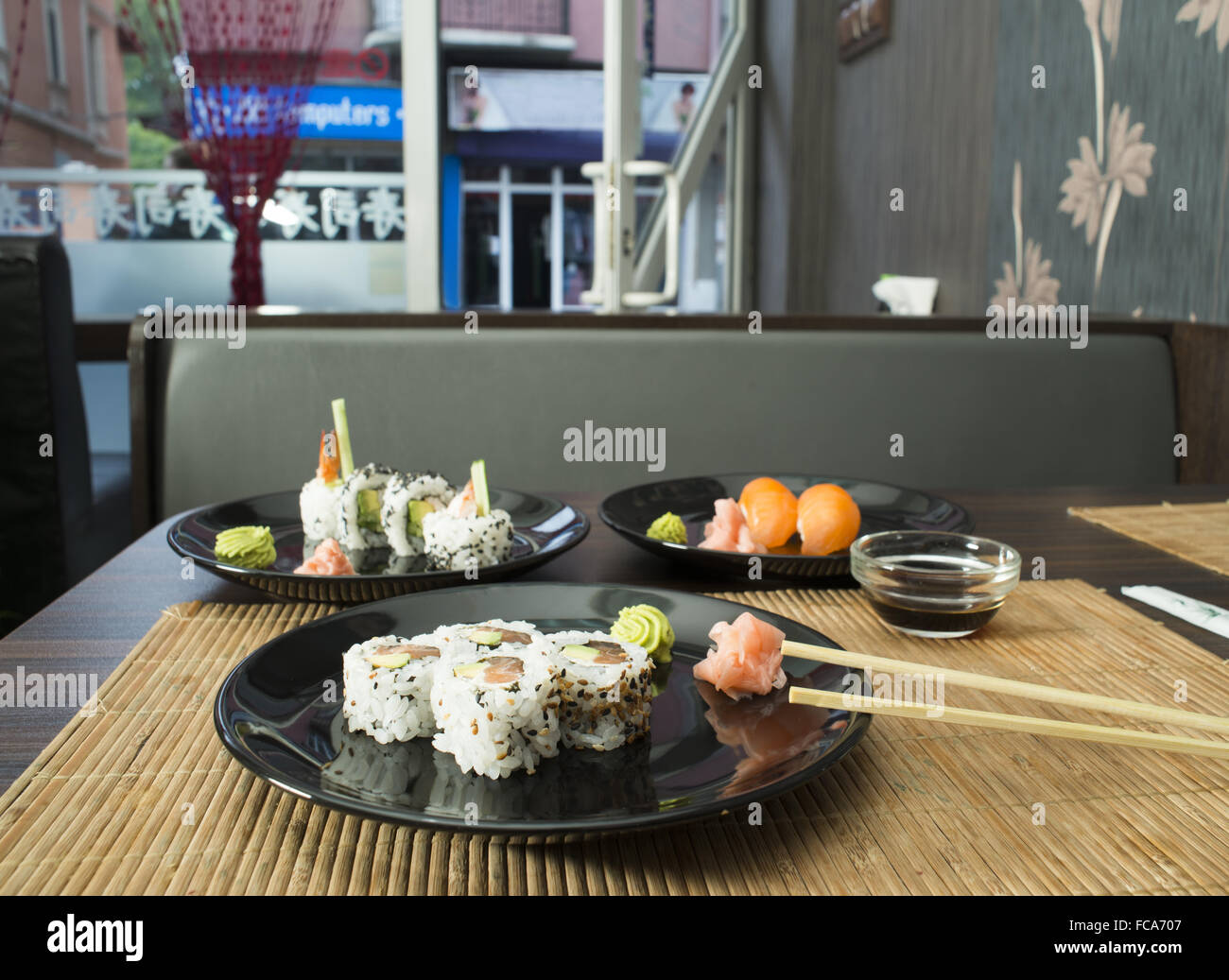 Sushi in restaurant Stock Photo - Alamy