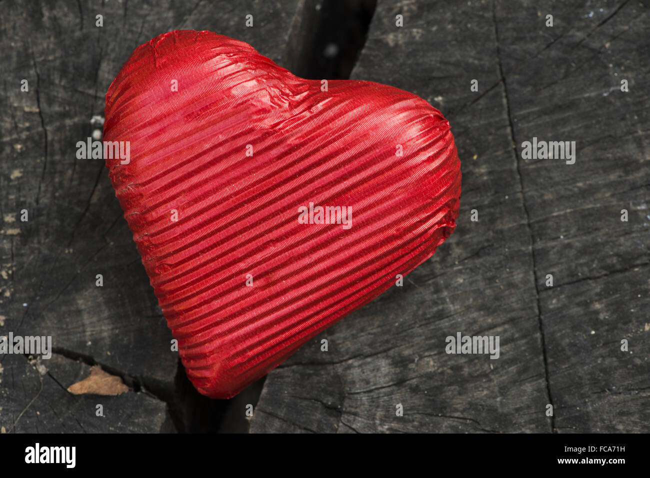 Red wrapped heart Stock Photo - Alamy
