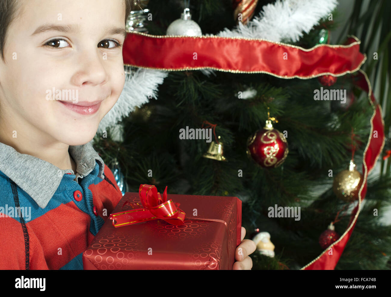Boy receive gift hi-res stock photography and images - Alamy
