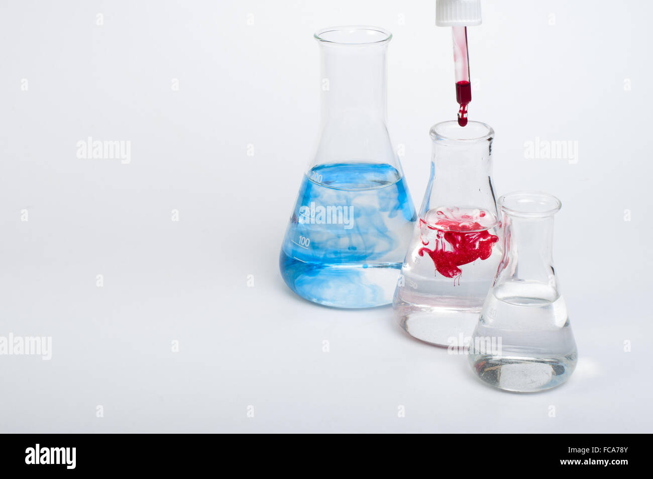 Laboratory equipment and color chemicals Stock Photo - Alamy