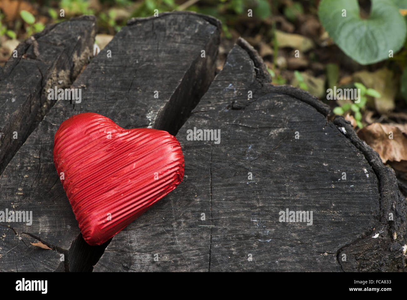 Red wrapped heart Stock Photo - Alamy