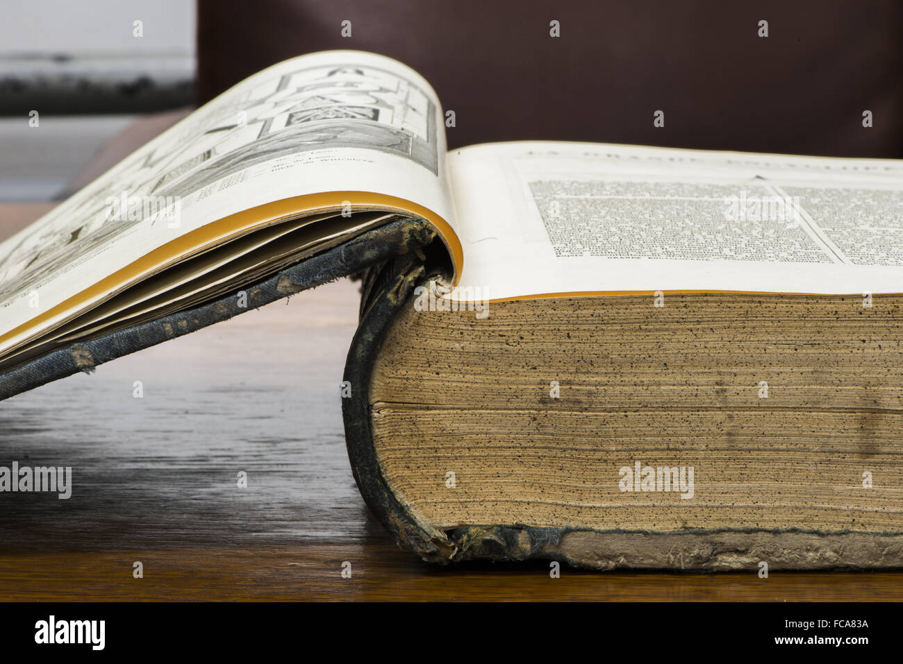 Open old book Stock Photo - Alamy