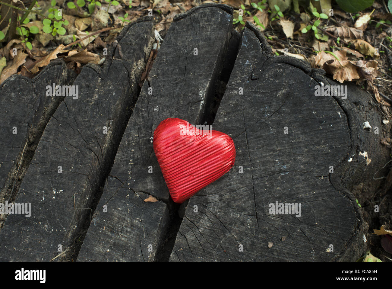 Red wrapped heart Stock Photo - Alamy