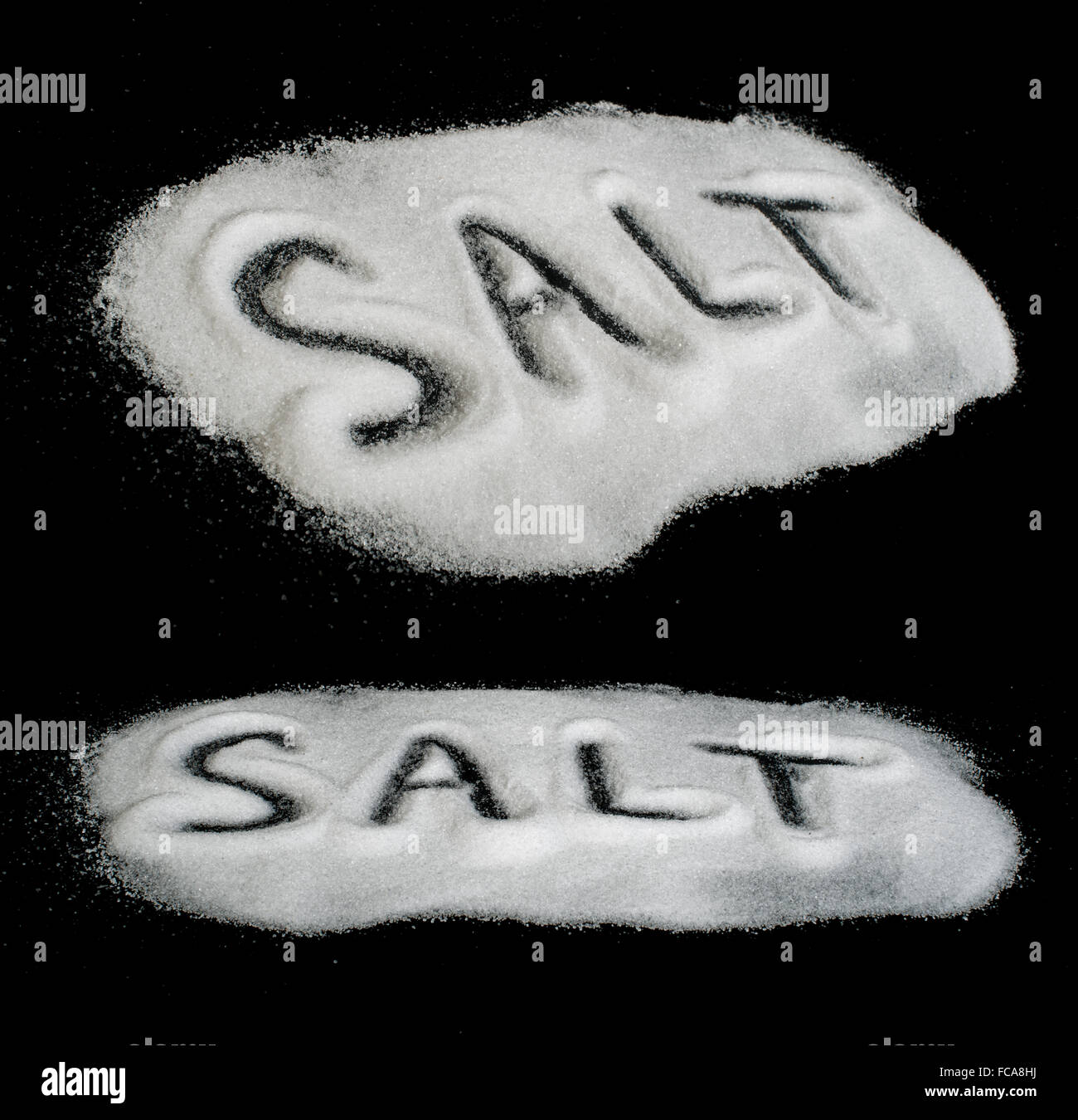 Word Salt on black background Stock Photo - Alamy