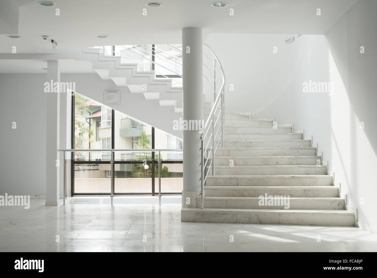 Interior of a building with white walls Stock Photo - Alamy