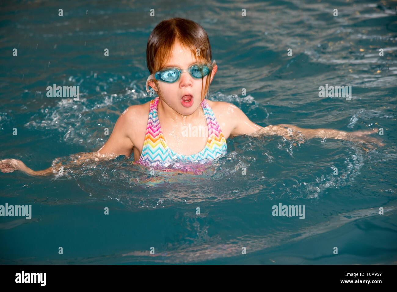 Kids learning to swim hi-res stock photography and images - Alamy