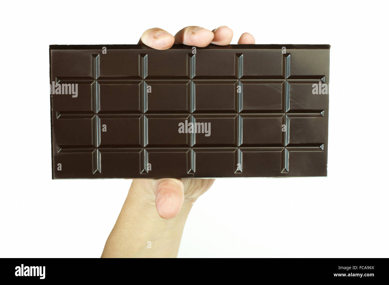 Hand holding chocolate bar hi-res stock photography and images - Alamy