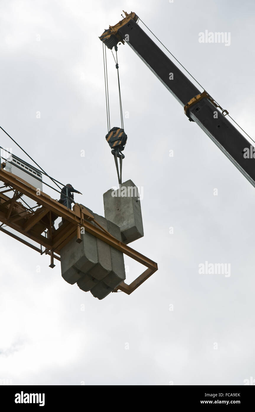 Two cranes assembly Stock Photo - Alamy