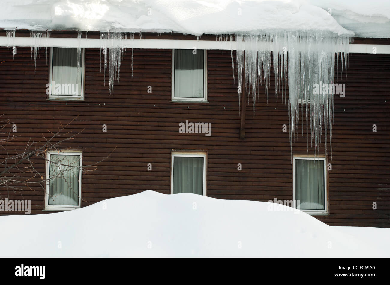 Icicles on window Stock Photo - Alamy