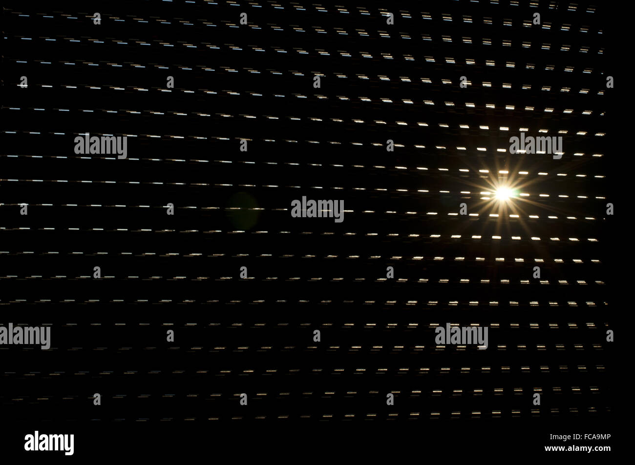 Backlight from the sun over the blinds Stock Photo - Alamy