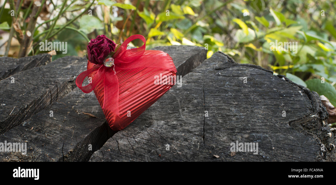 Red wrapped heart Stock Photo - Alamy