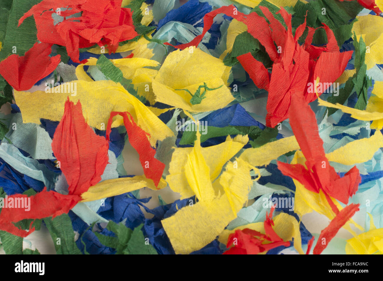 Many colorful pieces of torn paper Stock Photo - Alamy