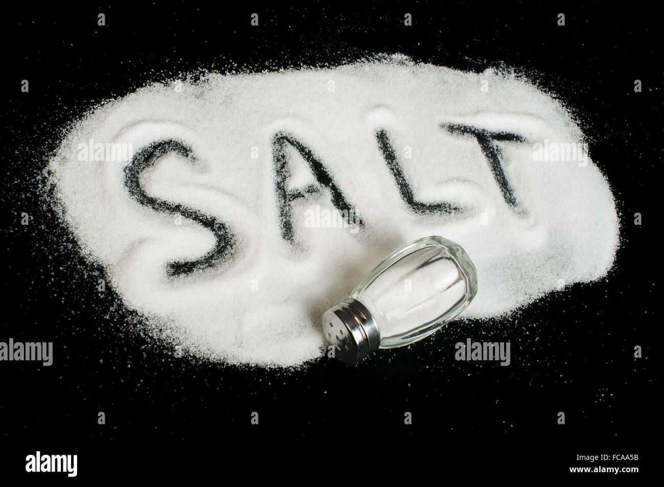 Word Salt on black background Stock Photo - Alamy