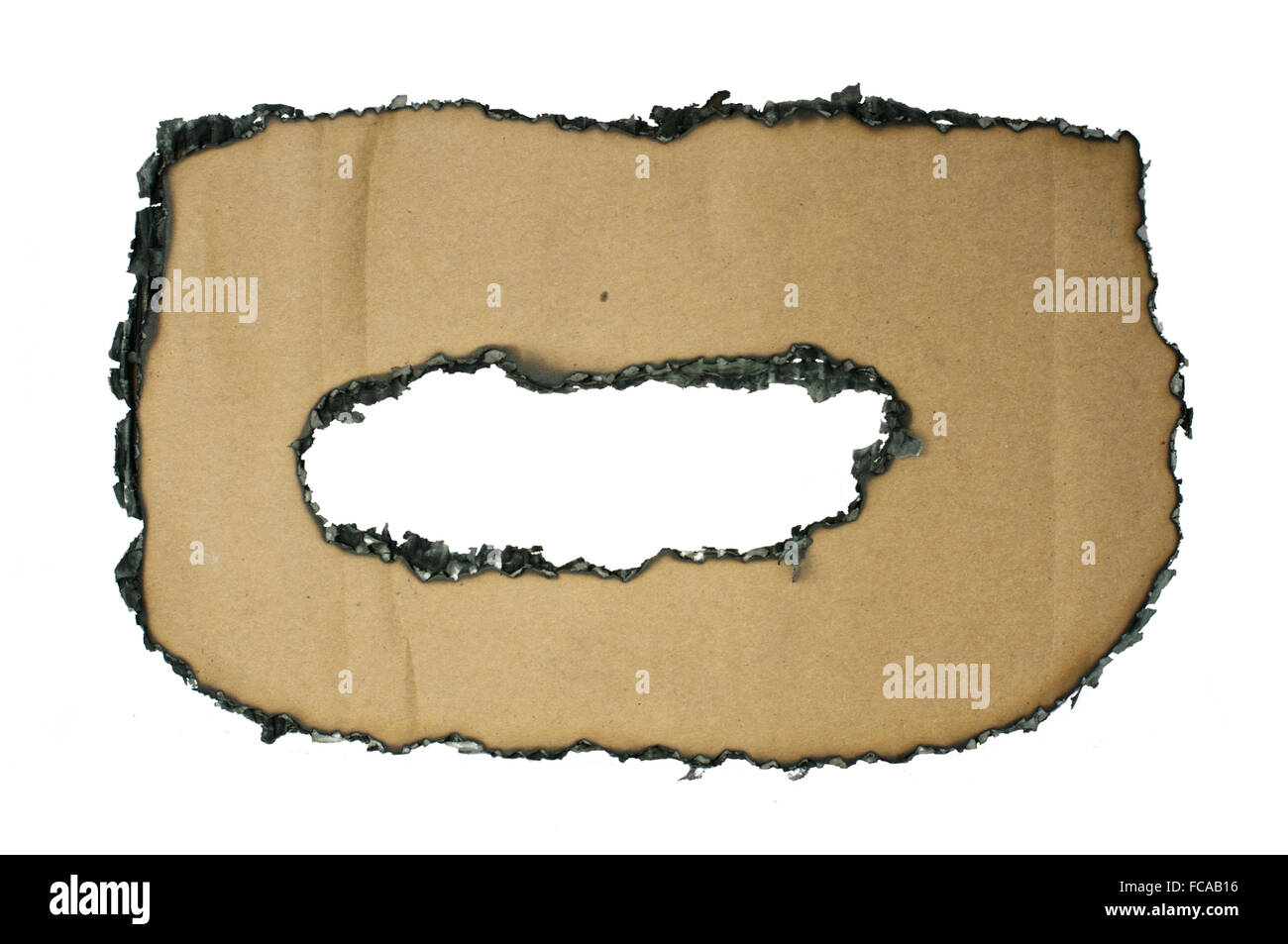 Burned paper and hole Stock Photo - Alamy