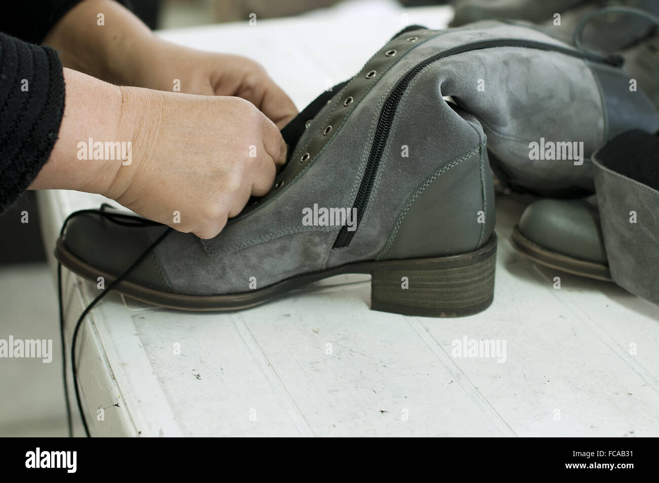 Handmade manufacture of footwear Stock Photo - Alamy