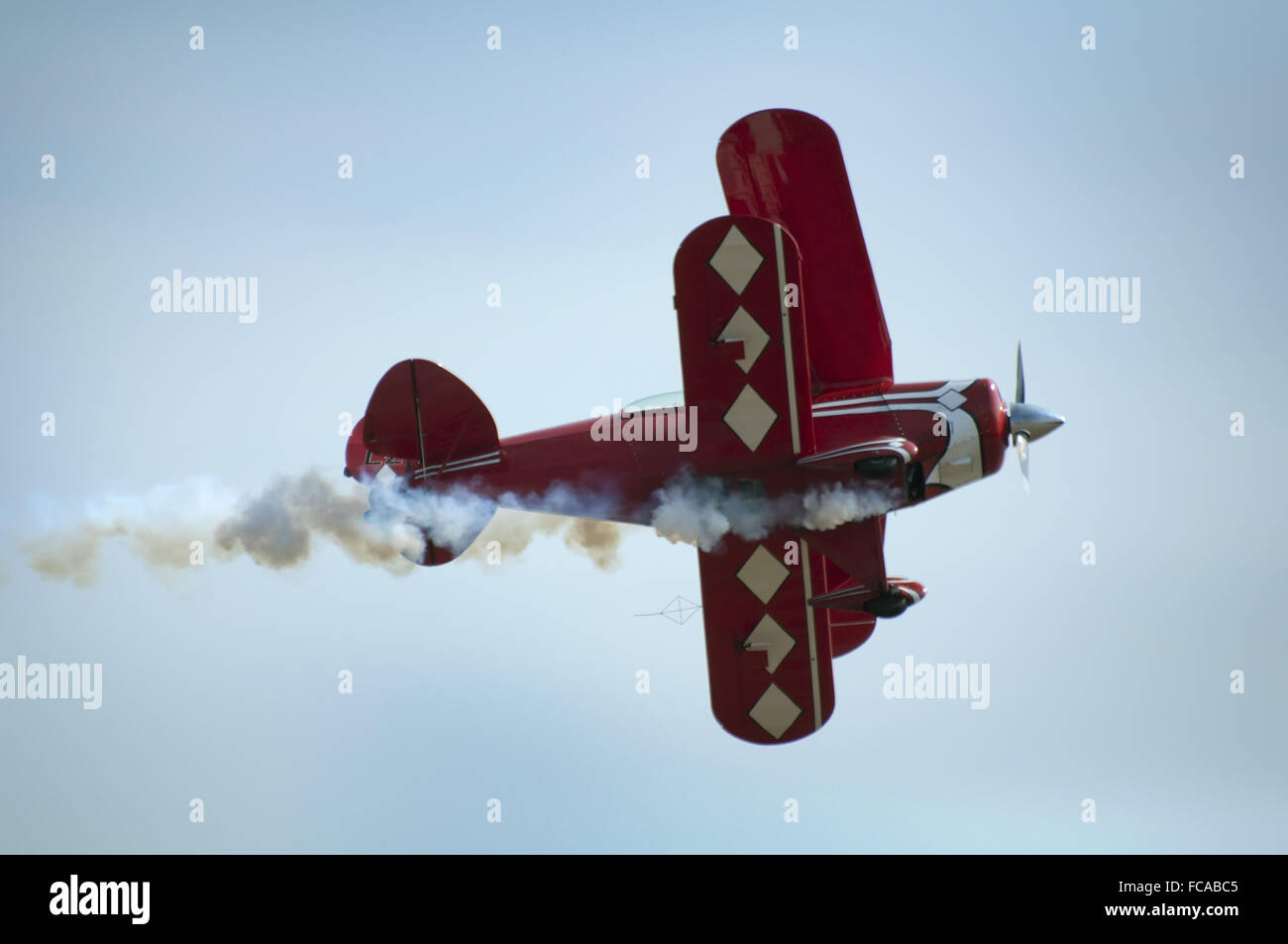 Red plane looping Stock Photo - Alamy