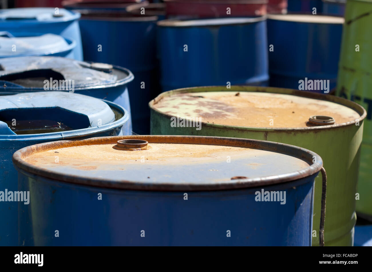 Old colored barrels for oil products Stock Photo - Alamy