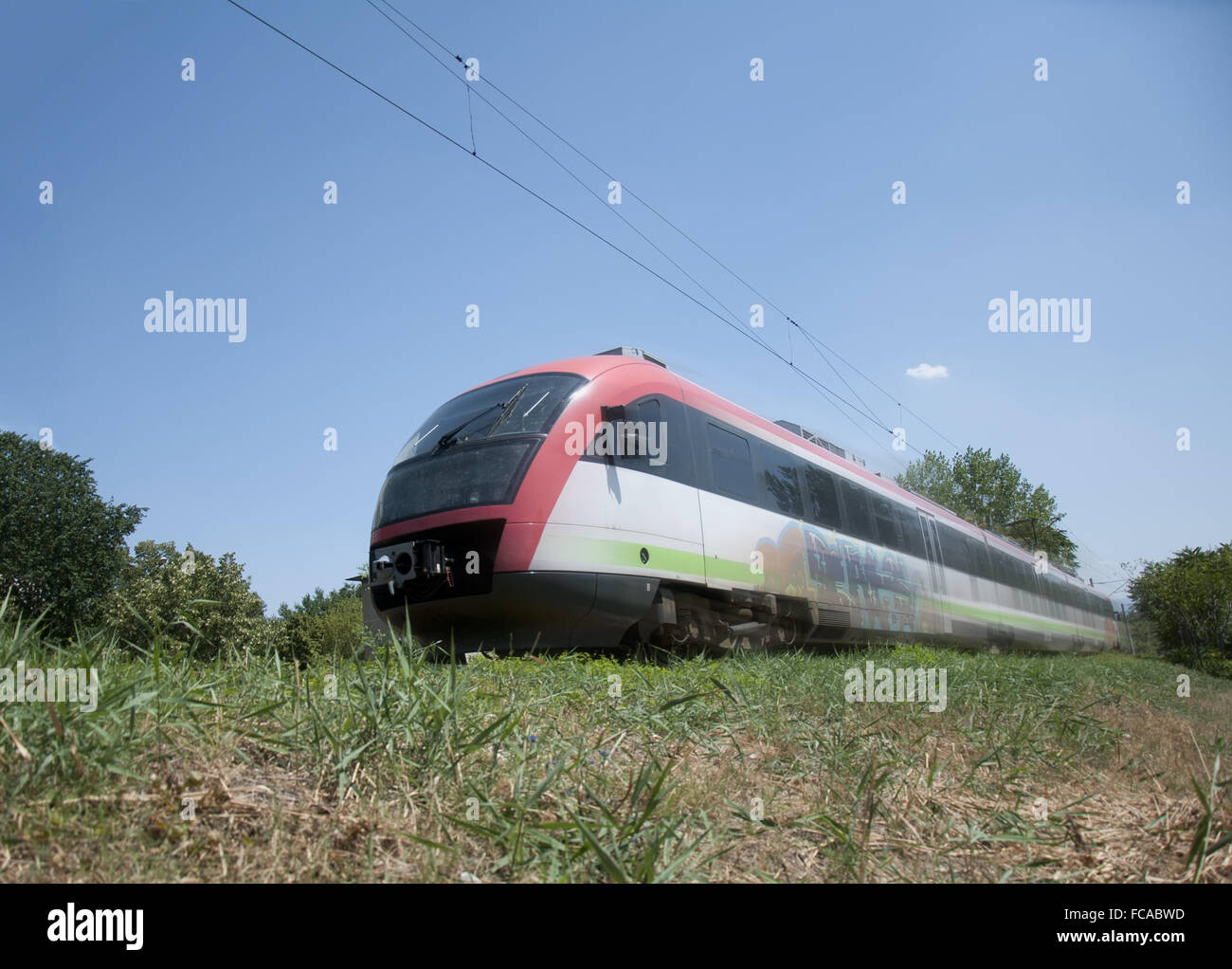 Electric train on the go Stock Photo - Alamy