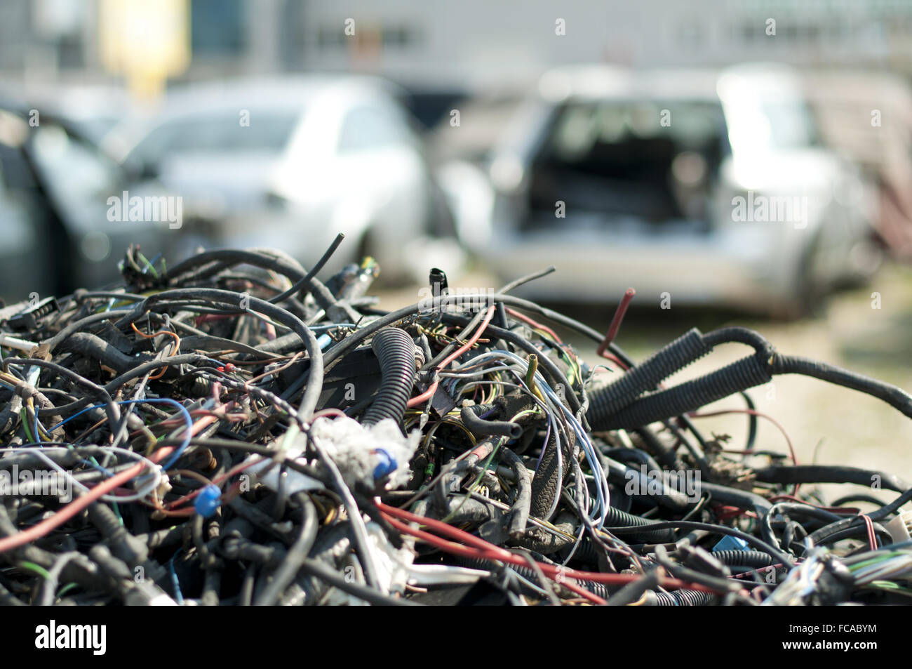 Old car parts and cables in automorgue Stock Photo - Alamy