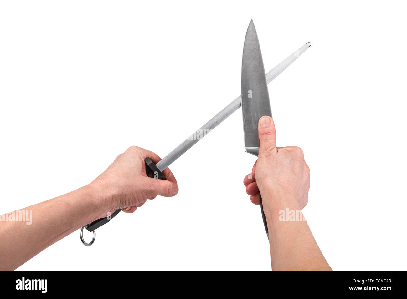 Knife hand sharpening technique - isolated on white with clipping path ...