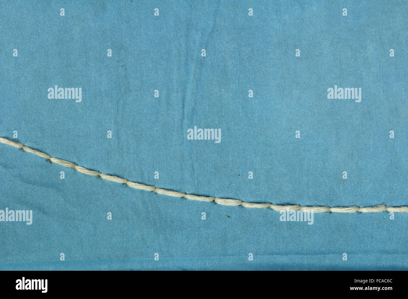 Blue paper seam Stock Photo - Alamy