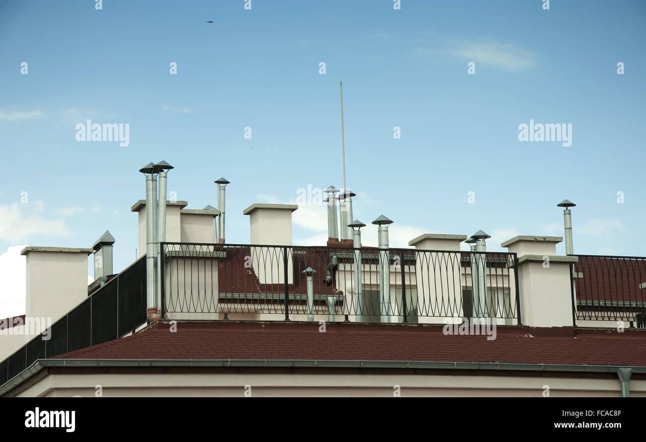 Many Chimneys on rooftop Stock Photo - Alamy