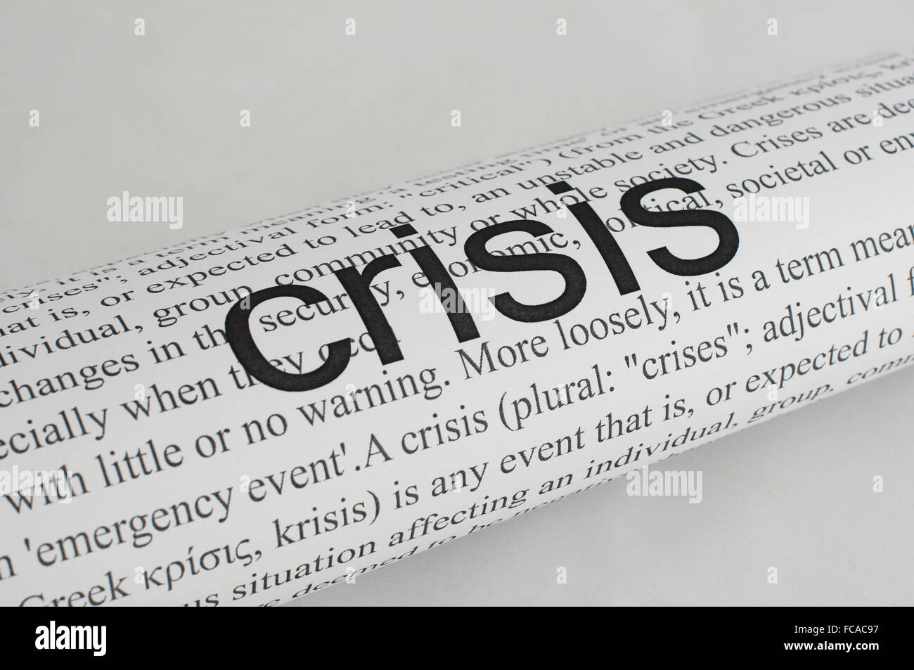 Typed text Crisis on paper Stock Photo - Alamy