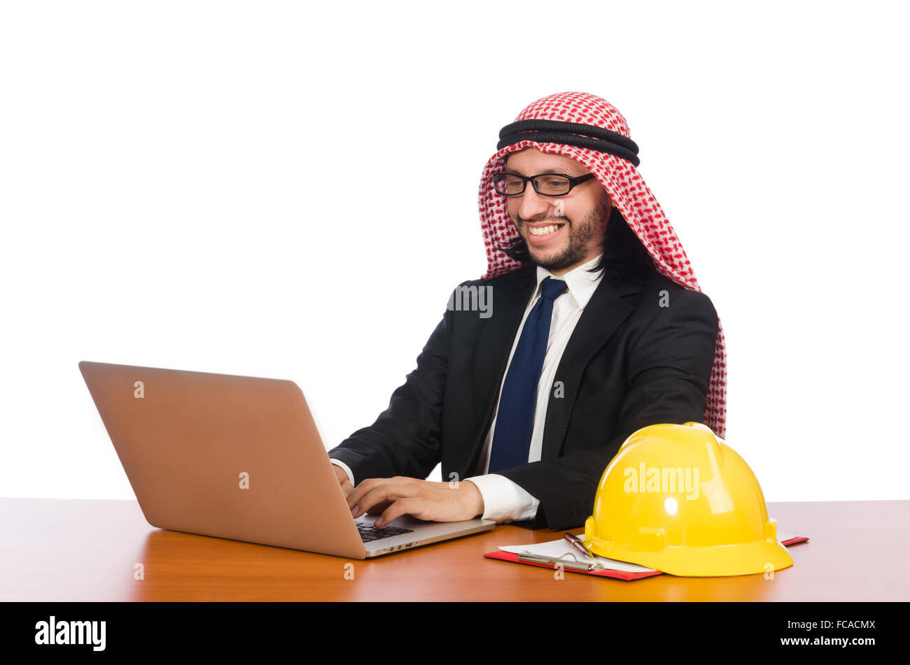 Arab man with computer and hardhat Stock Photo - Alamy