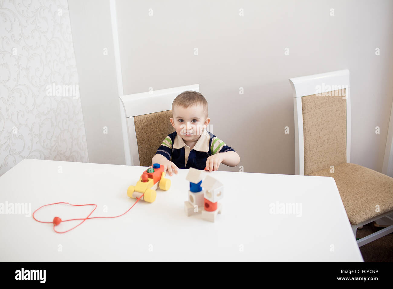 Cute baby boy with blocks Stock Photo - Alamy